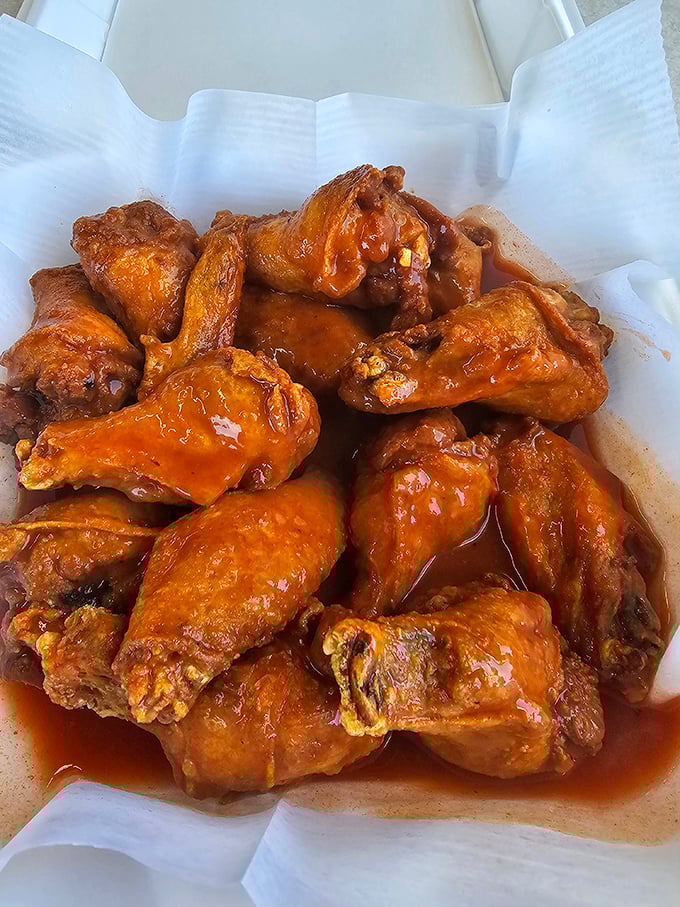 These wings aren't just cooked, they're transformed. Glistening with sauce that promises to recalibrate your understanding of chicken perfection.