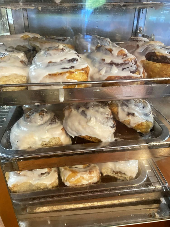 Cinnamon rolls so magnificent they deserve their own ZIP code. Each one is practically a self-contained dessert metropolis.
