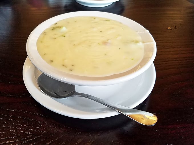 A bowl of creamy clam chowder that whispers, "Cancel your plans for the afternoon&mdash;this moment deserves your full attention."
