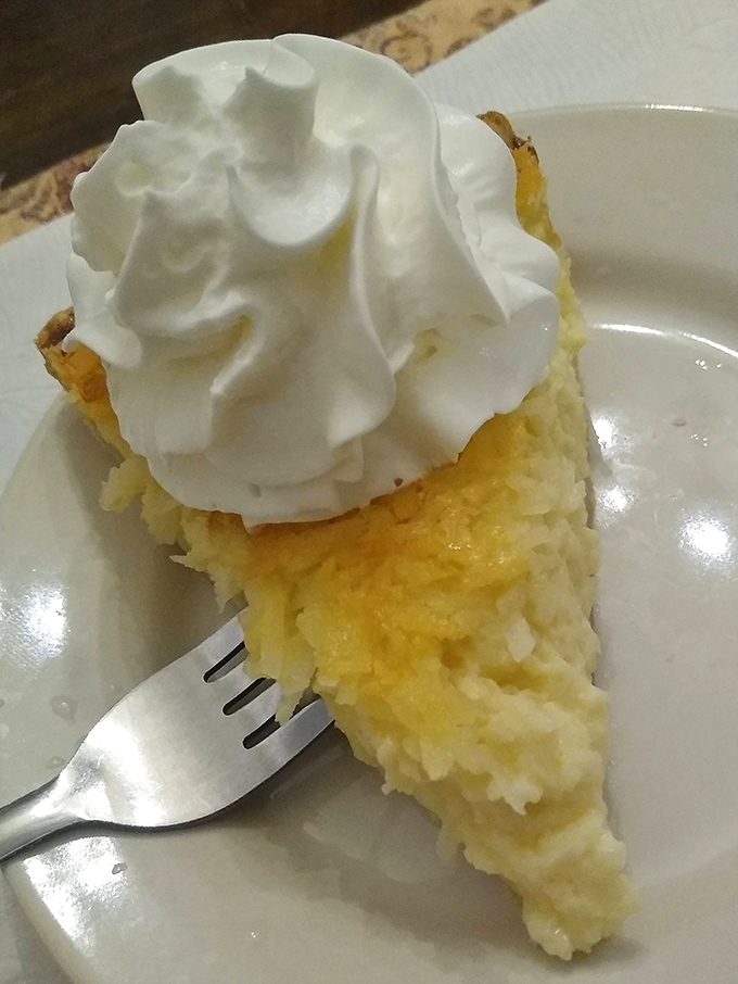 Coconut cream pie that deserves its own zip code. That cloud of whipped cream isn't garnish&mdash;it's the heavenly gateway to coconut paradise below. 