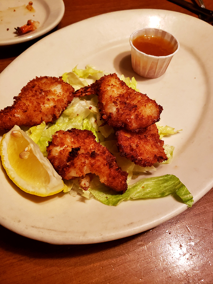 Golden coconut shrimp that delivers tropical flavors with every crispy, succulent bite you'll savor completely.