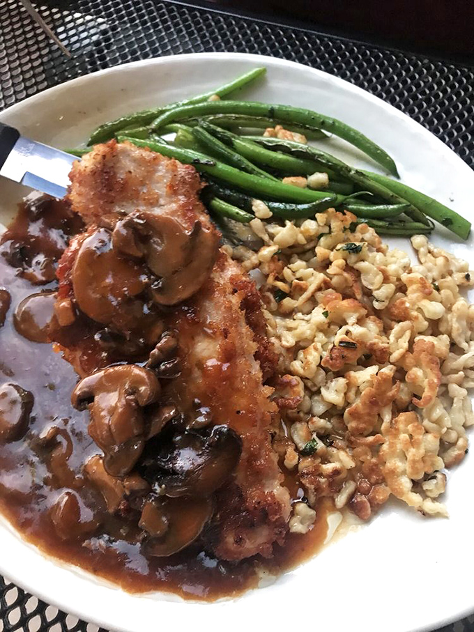 When schnitzel meets mushroom sauce, it's like Germany sent Pennsylvania a delicious postcard saying "Wish you were eating this."