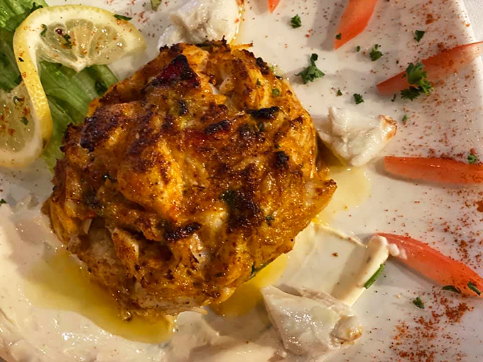 The legendary crab cake that launched a thousand road trips&mdash;golden-crusted perfection with barely enough binder to keep the sweet lumps together.