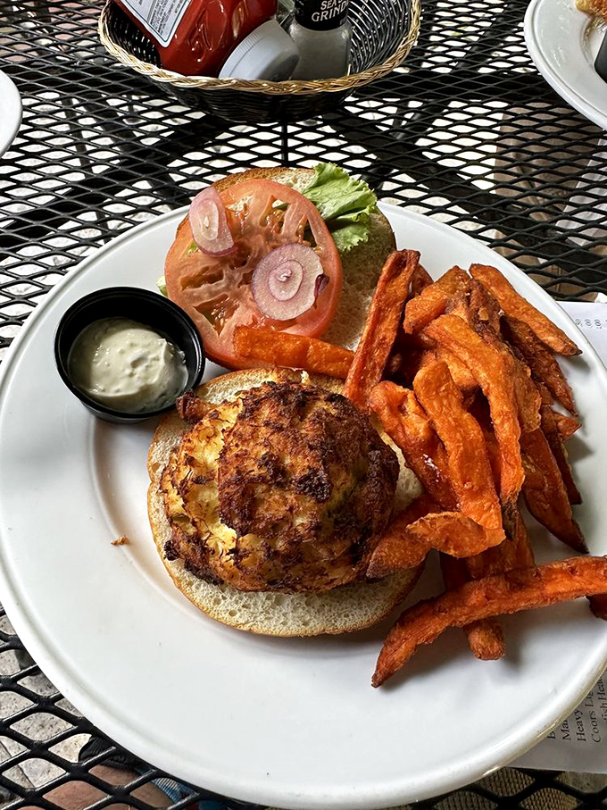 The star of the show: a crab cake sandwich that's practically all crab, barely bound together with what must be wishful thinking and a prayer, served with sweet potato fries.