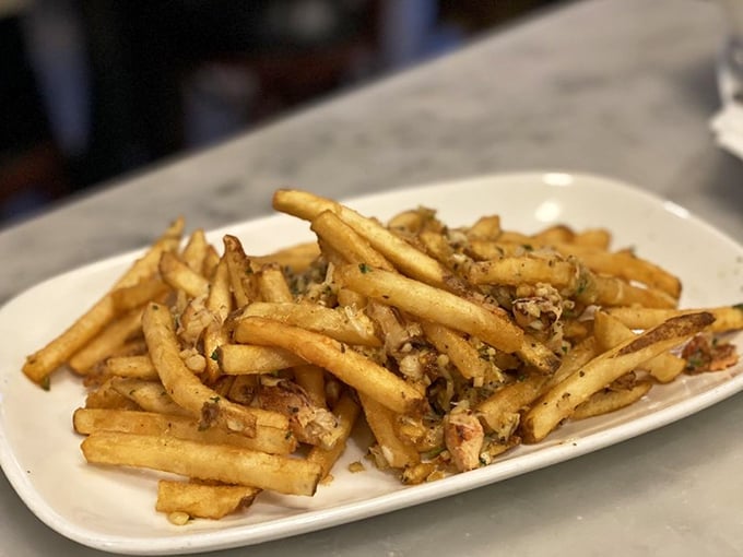 Golden fries meet sweet crab meat in this brilliant fusion that redefines comfort food forever.