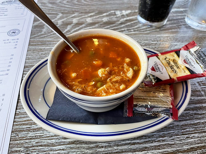 Maryland crab soup: where every spoonful delivers a warming hug of Old Bay-kissed broth and sweet crab chunks.