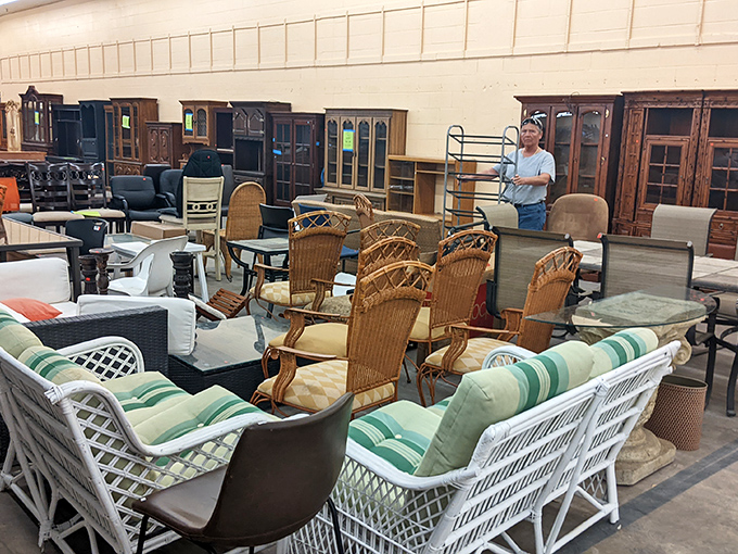 Shoppers navigate the ReStore's expansive offerings with the focused determination of archaeologists on the brink of discovery.