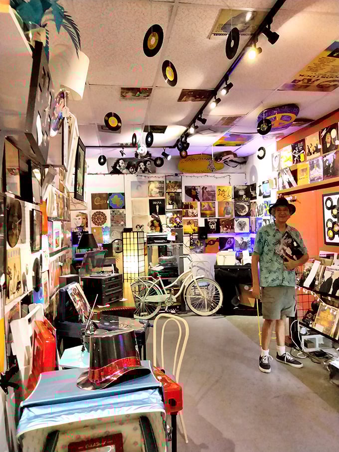 The music section is a vinyl lover's paradise, where records hang like musical moons and nostalgic album art creates a galaxy of memories.