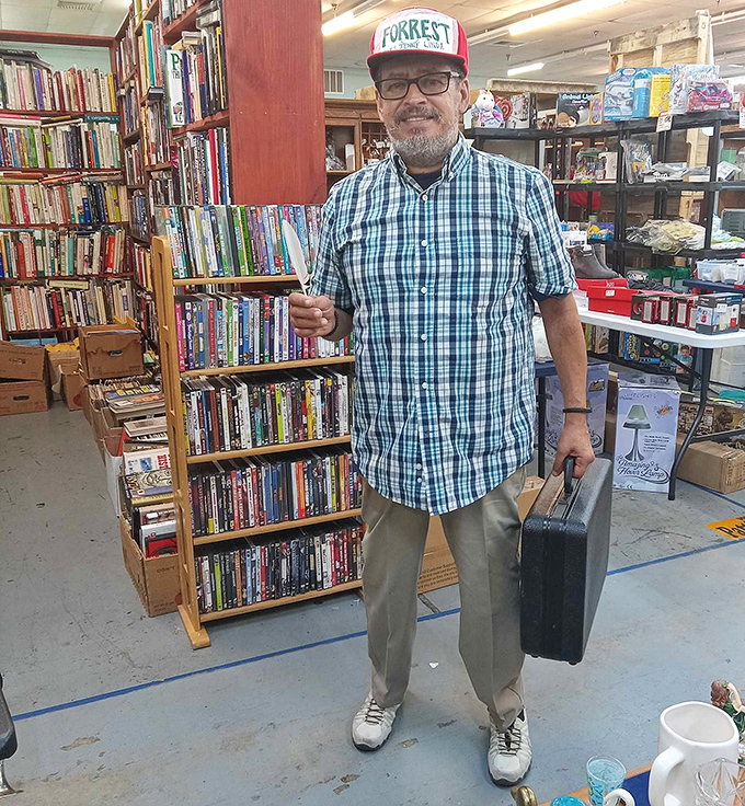 The book section houses literary treasures and the occasional passionate vendor ready to recommend their favorite reads.