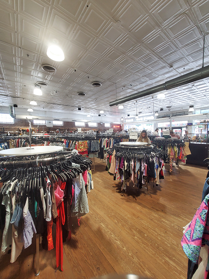 The wooden floors have witnessed countless fashion epiphanies as shoppers navigate the carefully curated wilderness of pre-loved treasures.