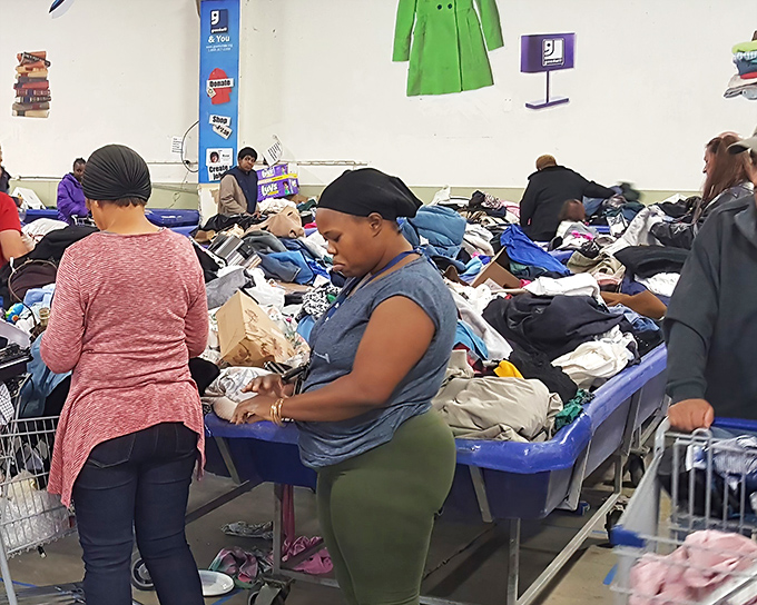 The dedicated archaeologists of secondhand shopping, carefully excavating fashion finds. Their concentration rivals surgeons performing delicate operations.