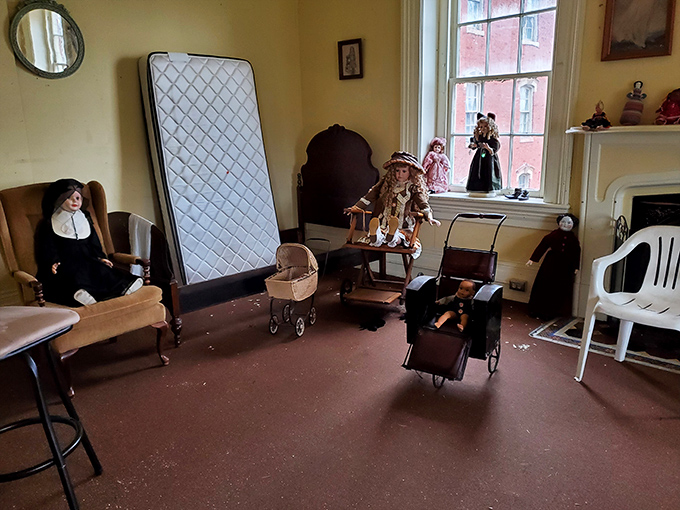 Someone's unsettling idea of decoration? These vintage dolls create an impromptu "committee meeting" that would make Stephen King reach for his notepad.