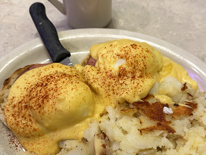 Eggs Benedict with a sprinkle of paprika that says, "Yes, we care about the details." Hollandaise so rich it could buy a vacation home.