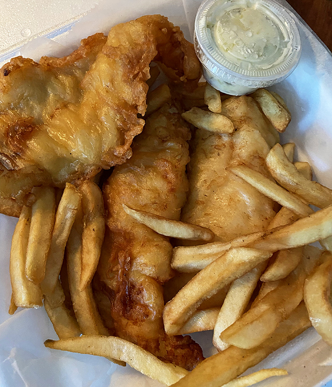 Golden-battered fish alongside perfectly crisp fries—a combination so timeless it makes you wonder why we ever bothered inventing molecular gastronomy.