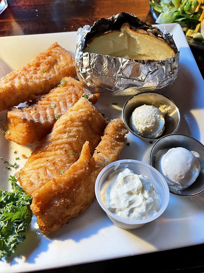 Wisconsin's fish fry tradition reaches its golden-brown pinnacle here, with that perfect crunch giving way to flaky tenderness that would make Neptune himself applaud.
