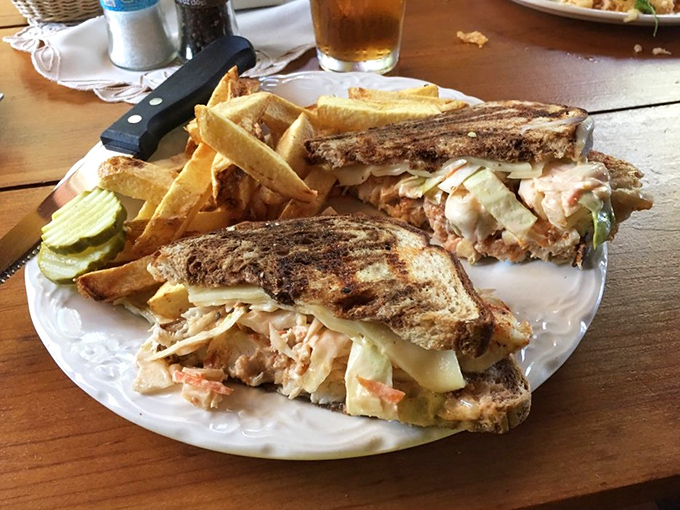 The ultimate comfort food marriage: grilled sandwich meets seafood delight. This creation makes you wonder why more sandwiches don't get this creative.