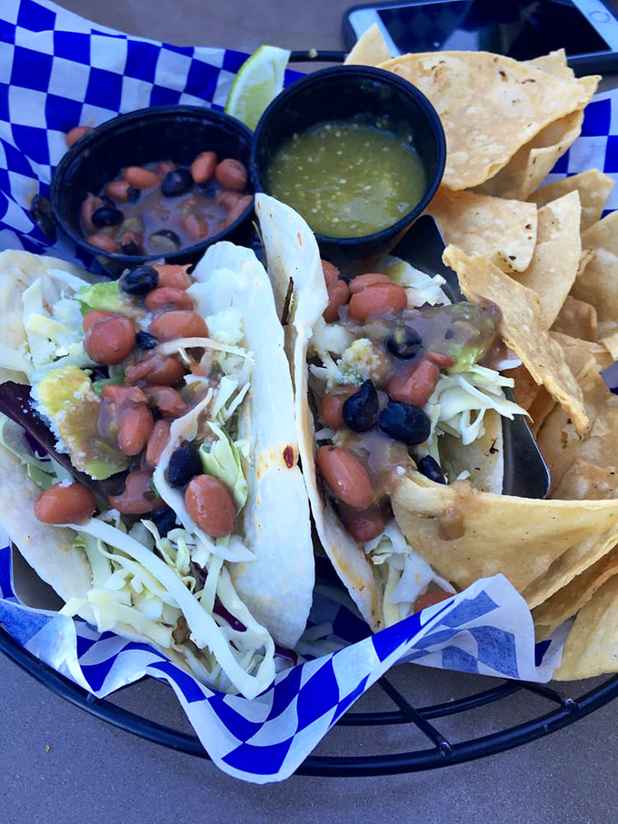 Fish tacos that make you question all other tacos you've ever known&mdash;topped with beans and cabbage and served with a side of harbor views.