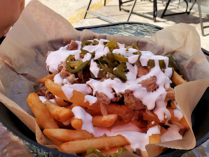 These aren't just loaded fries&mdash;they're a commitment. The perfect relationship between potato, meat, cheese, and jalape&ntilde;os, drizzled with a sauce that ties everything together.