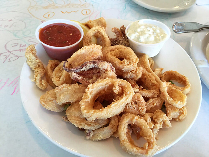 These golden calamari rings aren't just fried, they're transformed&mdash;crispy armor protecting tender treasures from the deep.