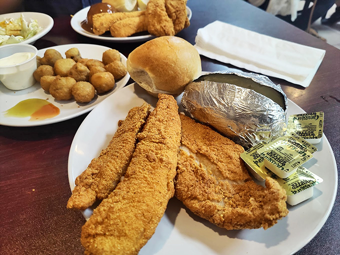 Cornmeal-crusted catfish that would make Mark Twain weep with joy. Those golden fillets are the Mississippi River's finest contribution to American cuisine.