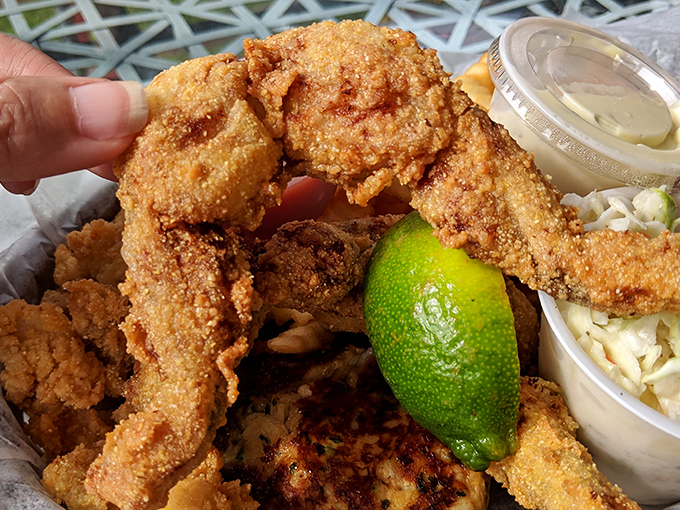 Golden-fried frog legs that would make Kermit nervous &ndash; crispy, tender, and served with a lime wedge that cuts through everything with citrusy perfection.