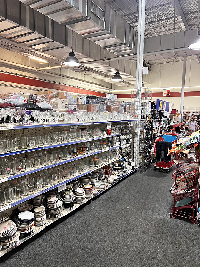 Crystal, everyday glassware, and quirky mugs coexist in perfect harmony. Your grandmother's china might be hiding here between vintage Pyrex and modern stemware.