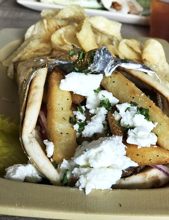 This gyro isn't just a sandwich, it's an edible love letter to Greece, with feta crumbles playing the perfect supporting role.