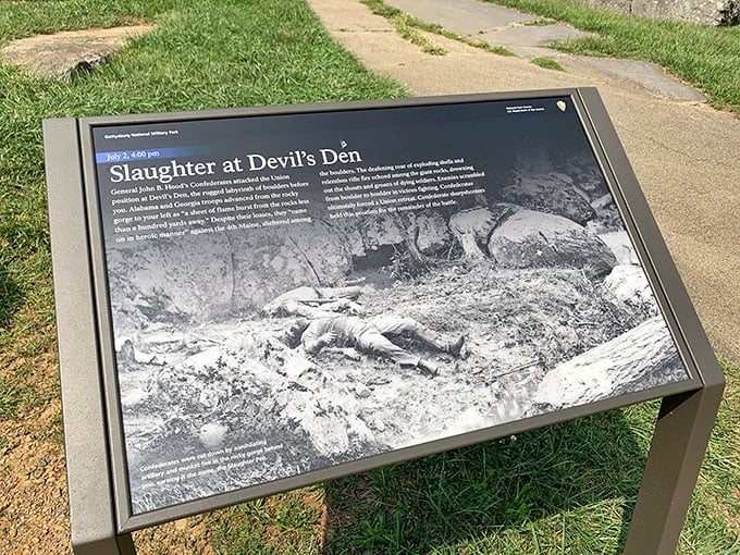 History etched in bronze and stone. This interpretive marker tells the sobering story of the slaughter at Devil's Den, where geology and human conflict intersected.