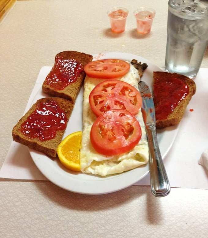 That moment when simple toast becomes transcendent. Homemade strawberry jam that would make your grandmother both proud and jealous.