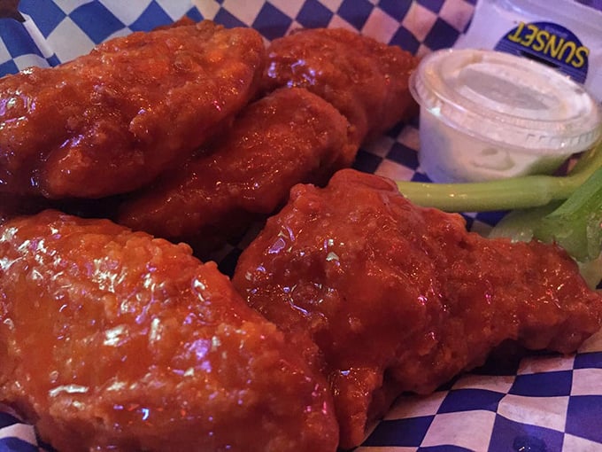 Wings that don't mess around. That vibrant sauce means business, bringing just enough heat to make you reach for your beer.