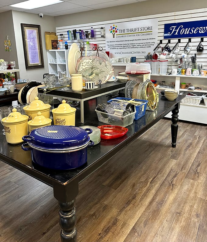 Kitchen treasures arranged with care. That cobalt Dutch oven isn't just cookware&mdash;it's the beginning of countless family meals waiting to happen.