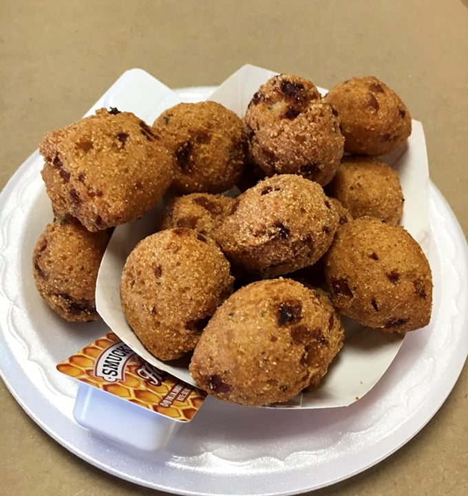 Golden-brown hush puppies that could make a Southern grandmother weep with joy &ndash; crispy outside, tender inside, perfect for sopping up crab juices.