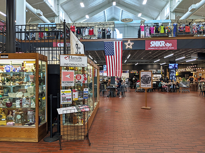 The stars and stripes stand tall amid the marketplace bustle. This isn't just shopping&mdash;it's a slice of heartland America under one roof.