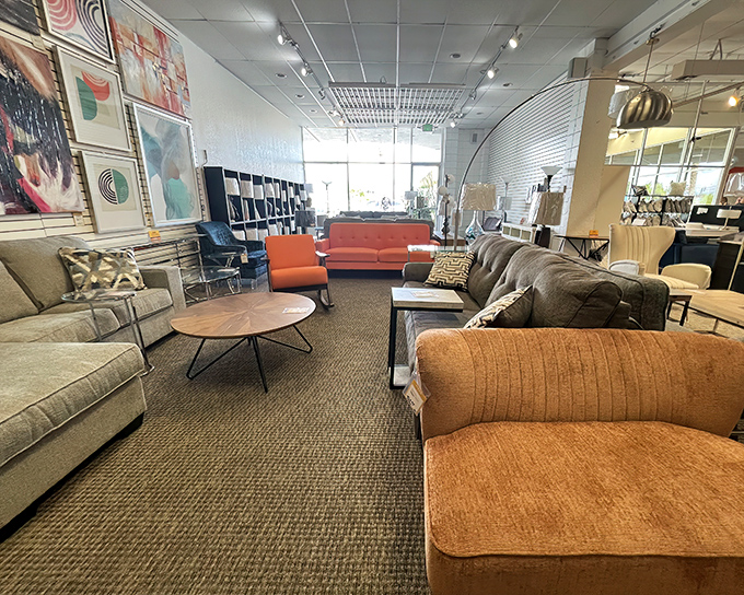 Living room heaven where every sofa tells a story. That curved floor lamp would make even Don Draper nod in approval.