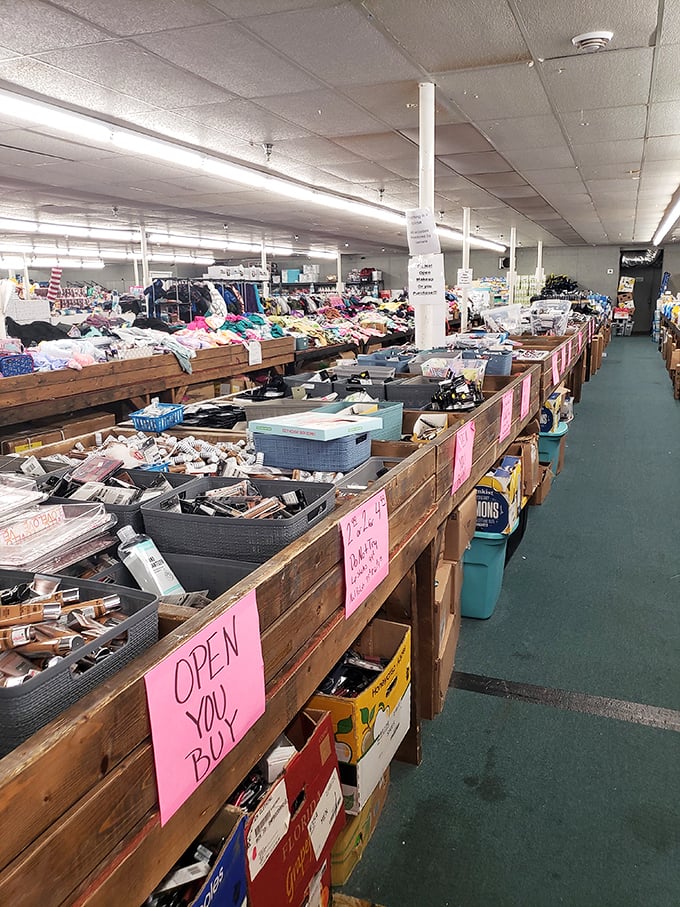 Wooden bins overflowing with potential discoveries. The "OPEN YOU BUY" sign might as well read "Abandon all budget restraint, ye who enter here."