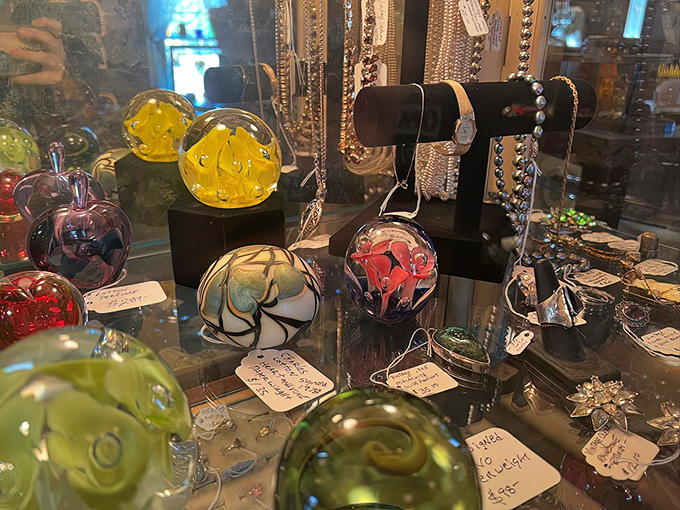 Colorful glass paperweights that capture light like tiny universes. Each one is basically a snow globe without the hassle of shaking or snow. 