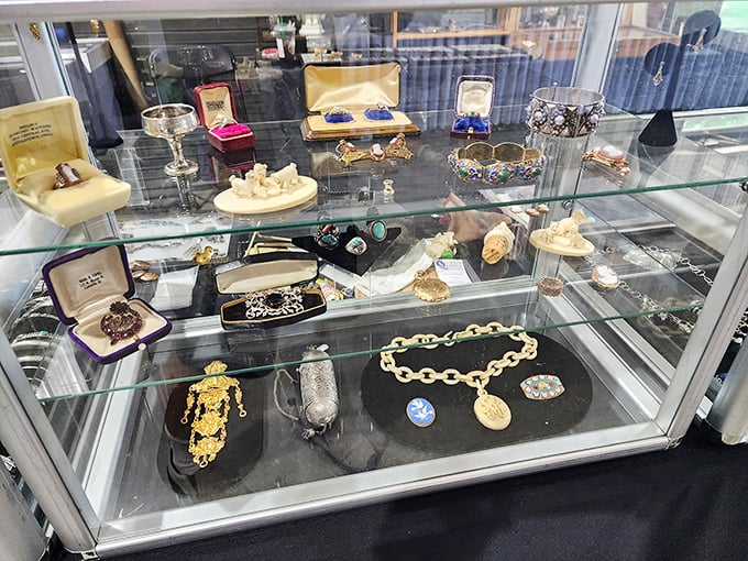 Tiny treasures with enormous stories. Each brooch and pendant in this glittering display once adorned someone's special occasion, now waiting for its second act.