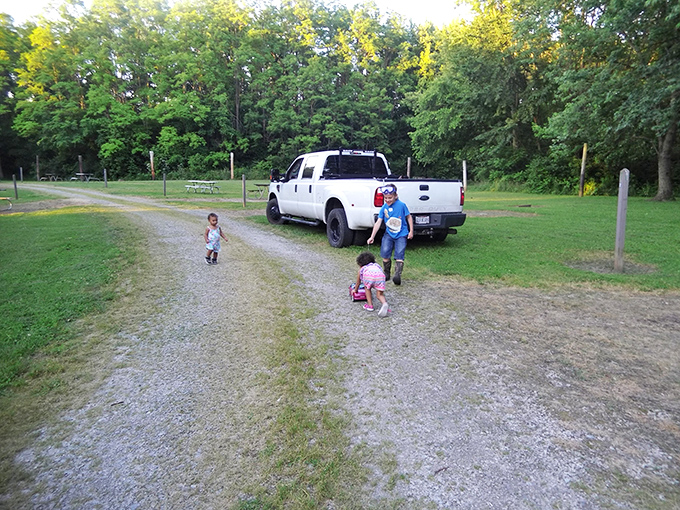 Childhood unplugged&mdash;the way we all grew up. Kids exploring gravel paths prove the best entertainment doesn't require batteries or Wi-Fi.