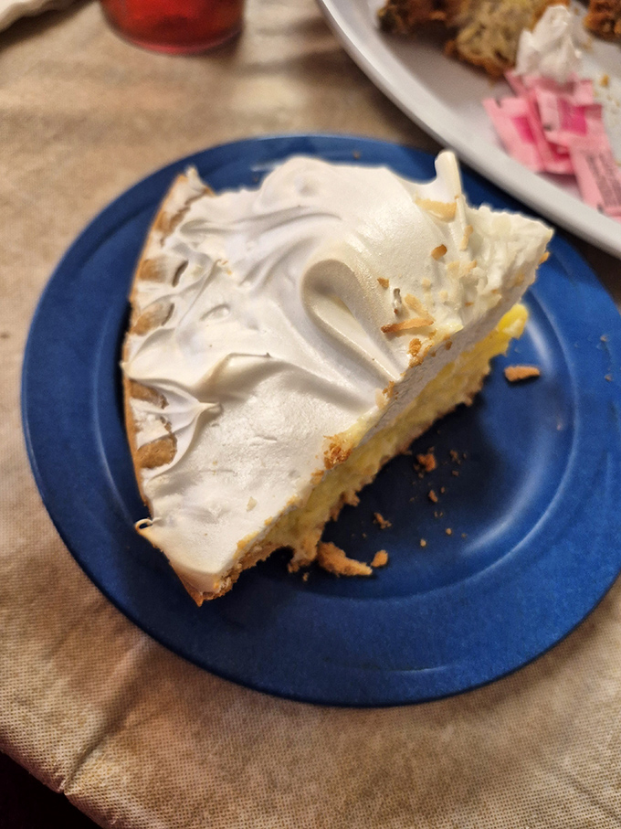 Lemon meringue pie with clouds of meringue so perfect they deserve their own weather system. This isn't dessert&mdash;it's edible happiness.