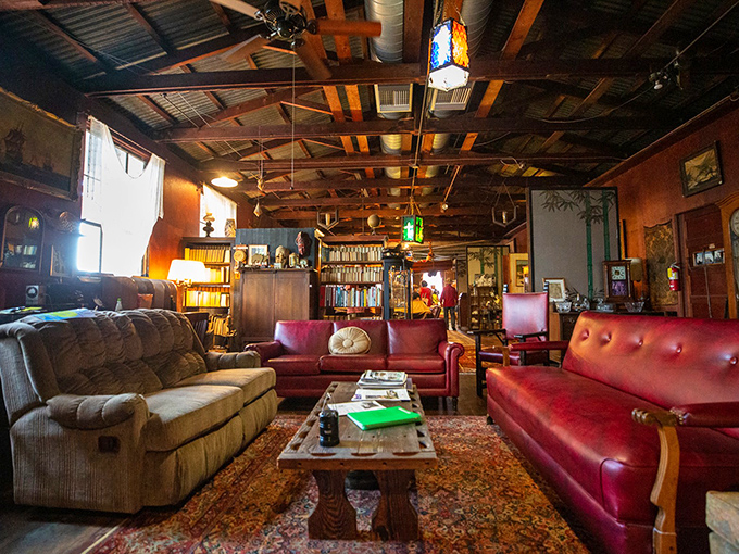 The living room that time forgot. Vintage furniture and eclectic decor create a cozy space that feels like stepping into a time capsule.