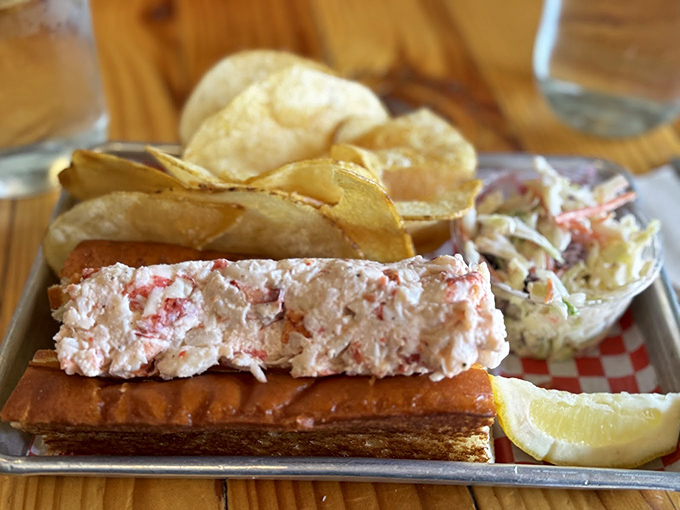 Not all heroes wear capes &ndash; some come on buttered rolls. This lobster roll doesn't just satisfy hunger; it resolves existential crises.