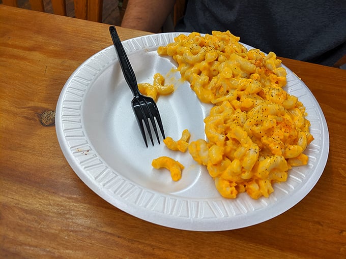 Mac and cheese that means business. This isn't some pale cafeteria side &ndash; it's a vibrant, cheesy masterpiece that demands equal billing with the barbecue.