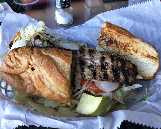 This isn't just a fish sandwich; it's Florida's maritime heritage lovingly tucked between two perfectly toasted buns with all the right fixings.