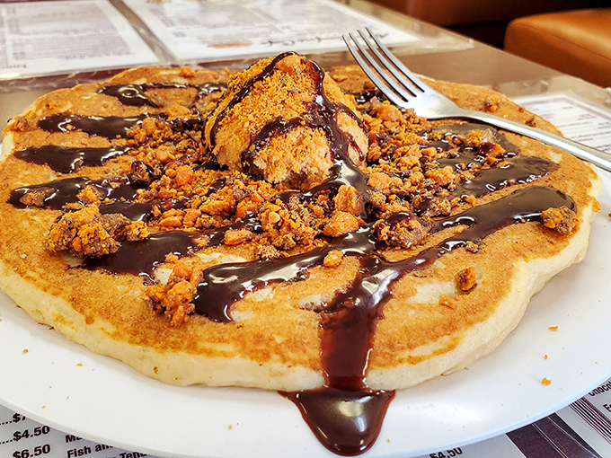 Not all heroes wear capes. Some come as pancakes topped with chocolate sauce and crumbled cookies that make you question all your adult decisions.