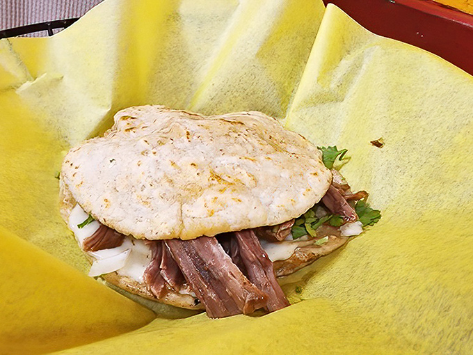 The mulita birria combines the best aspects of a quesadilla and taco, with tender meat peeking out beneath a perfectly fried tortilla like a delicious surprise.