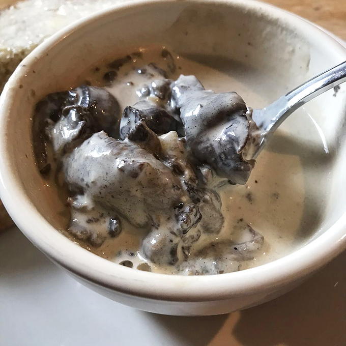 This mushroom soup arrives like a warm hug in a bowl, rich and comforting beyond all expectations.