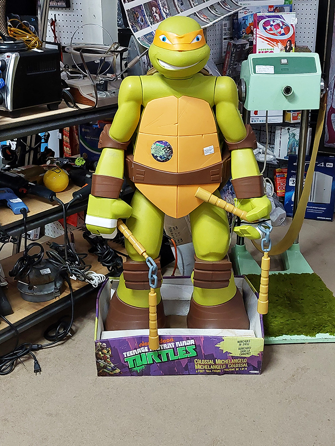 Cowabunga! This life-sized Michelangelo stands guard over vintage toys. Every '90s kid's dream come true, pizza not included.
