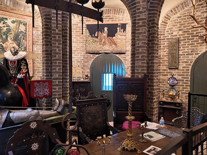 The king's study perhaps? Rich brick archways frame this medieval workspace, complete with period furniture and tapestries that whisper tales of centuries past. 