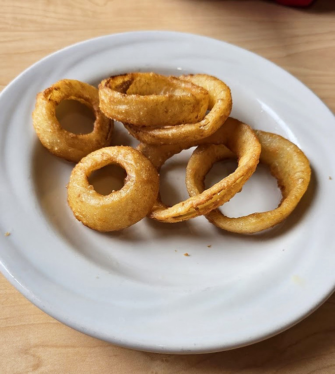 These onion rings aren't just fried to golden perfection&mdash;they're crispy, airy halos that make you wonder why vegetables ever bother showing up any other way.
