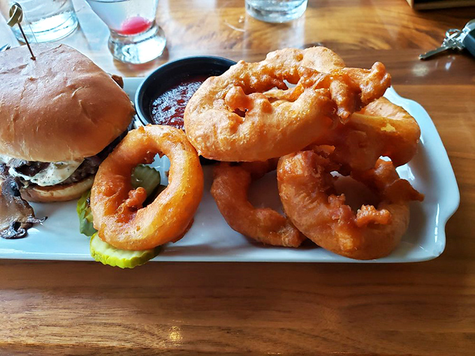 These aren't just onion rings; they're golden halos of crispy perfection that make you wonder why you ever bothered with fries.